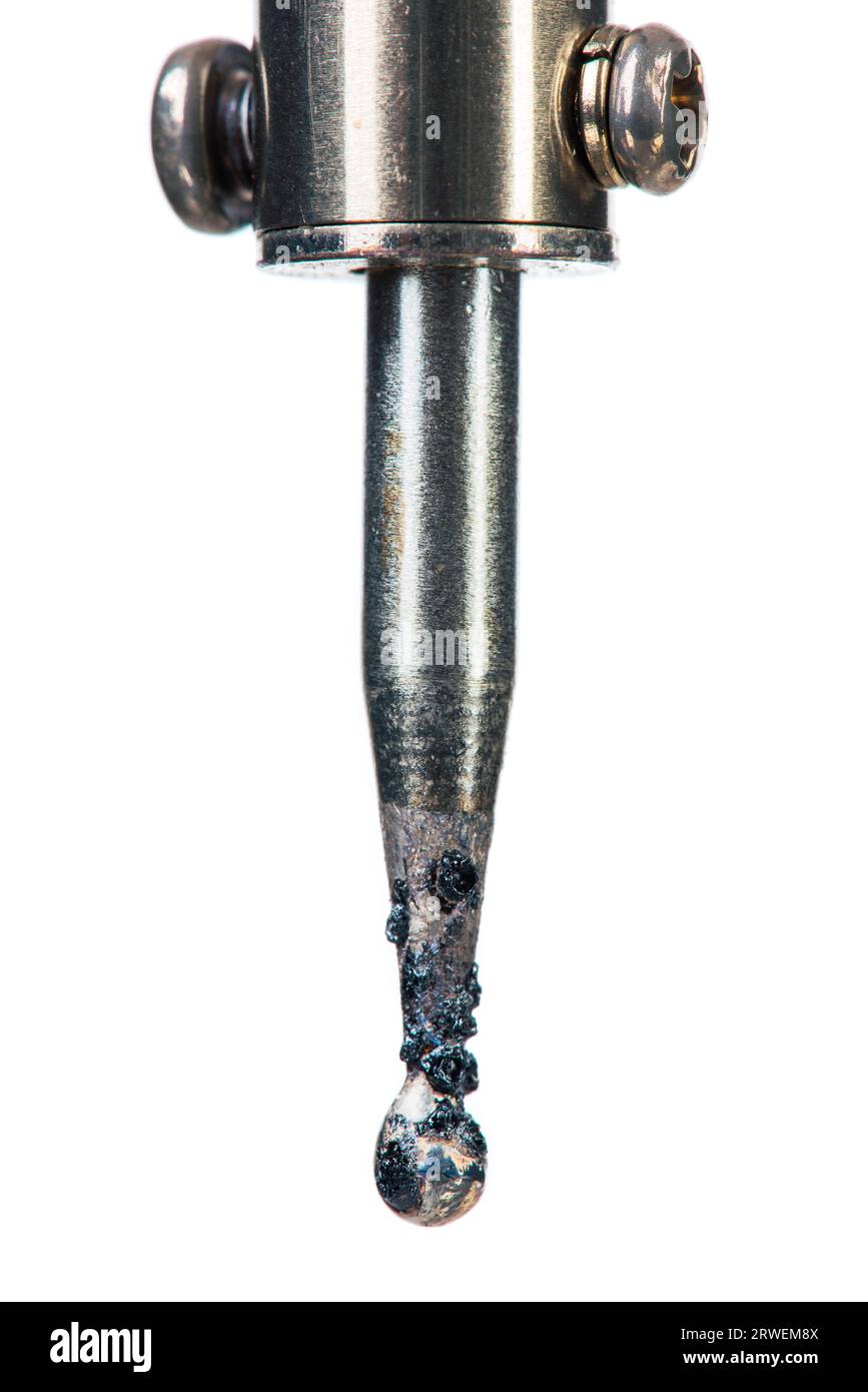 Soldering iron with drop of tin on tip, isolated on white background ...