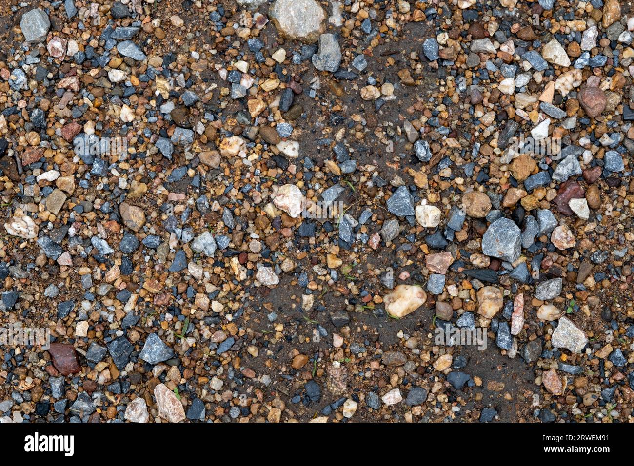 Gray small rocks ground texture. Black small road stone background ...