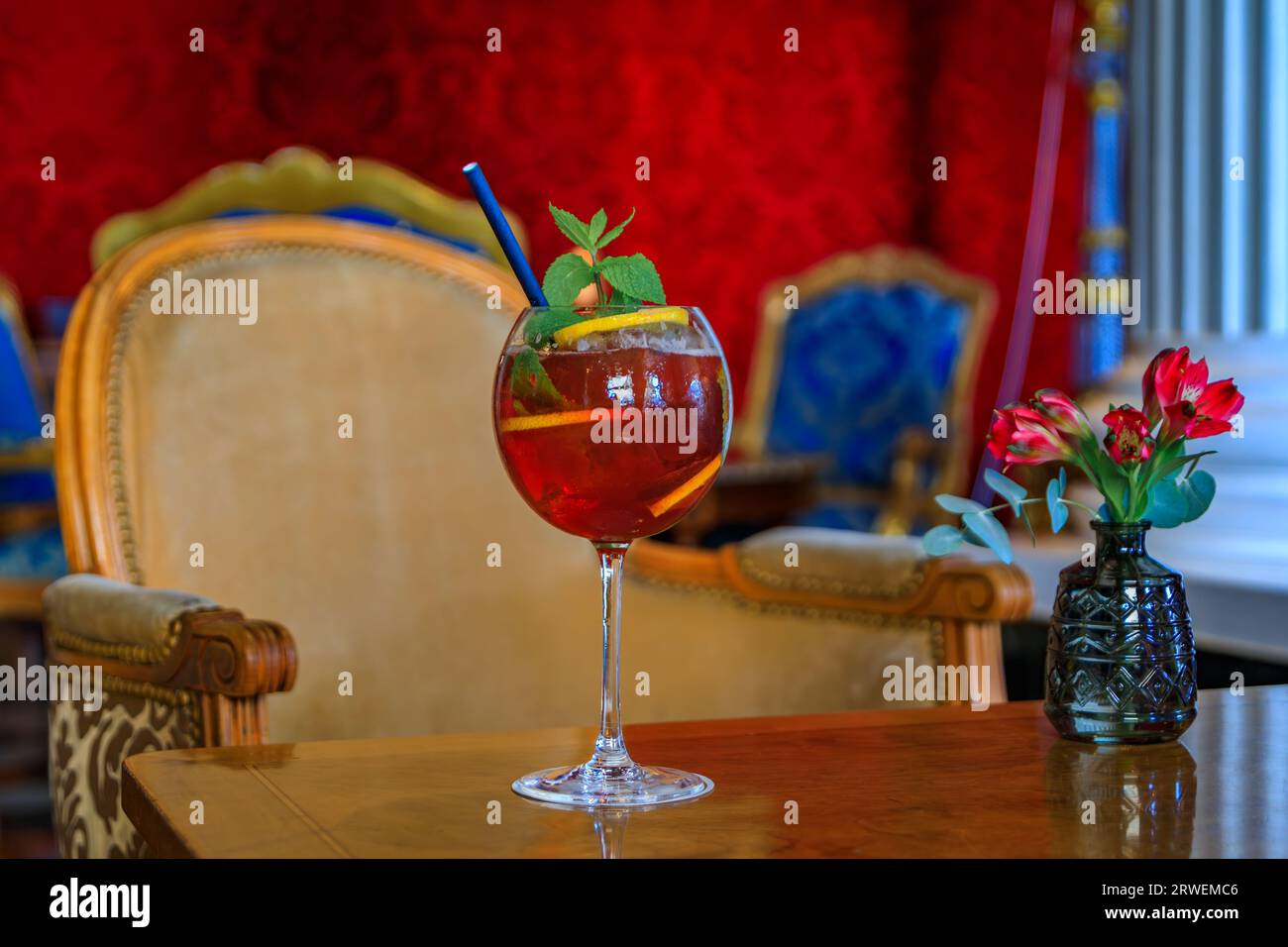 Cocktails waiting for customers and a colorful luxury interior at a ...