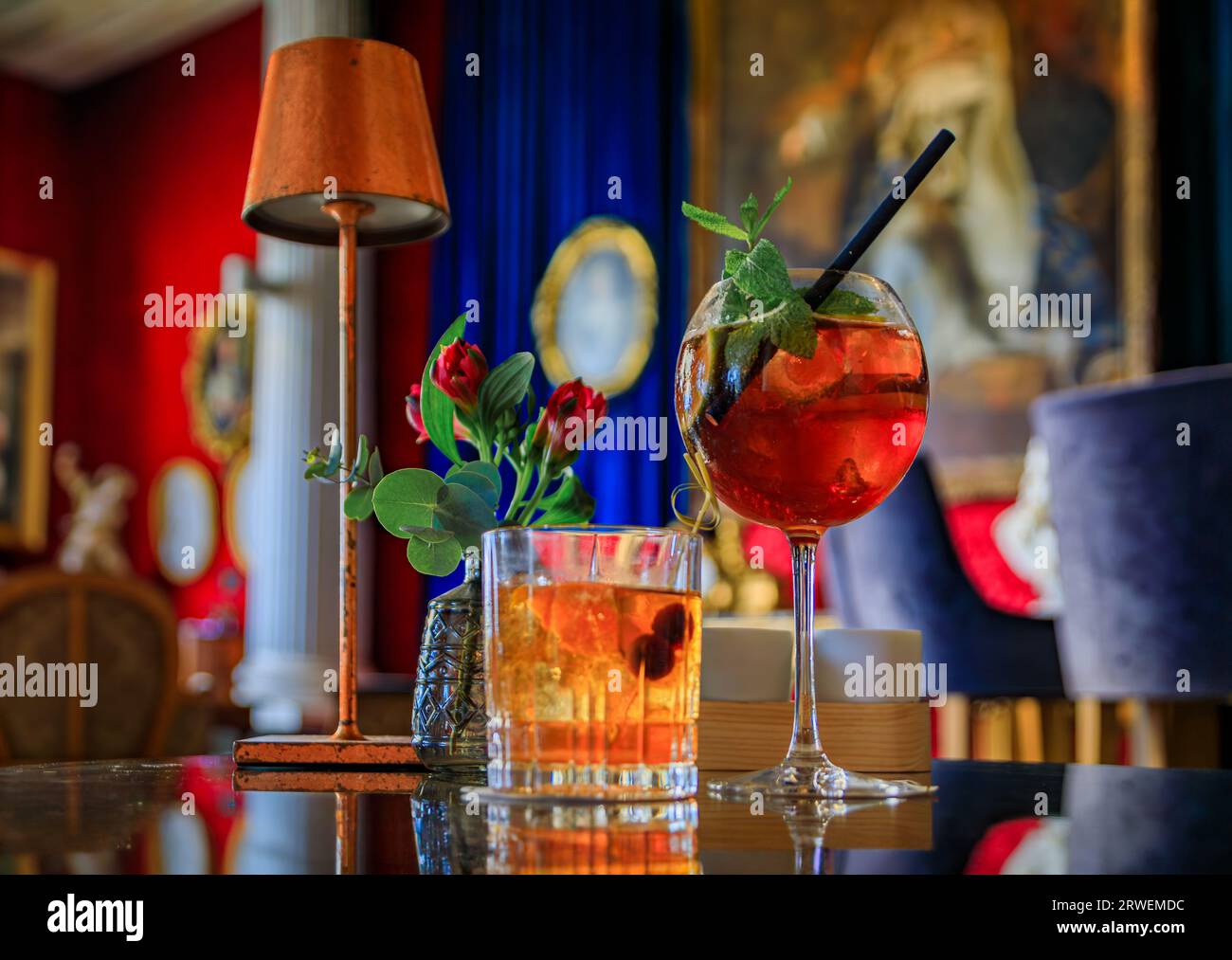 Cocktails waiting for customers and a colorful luxury interior at a ...
