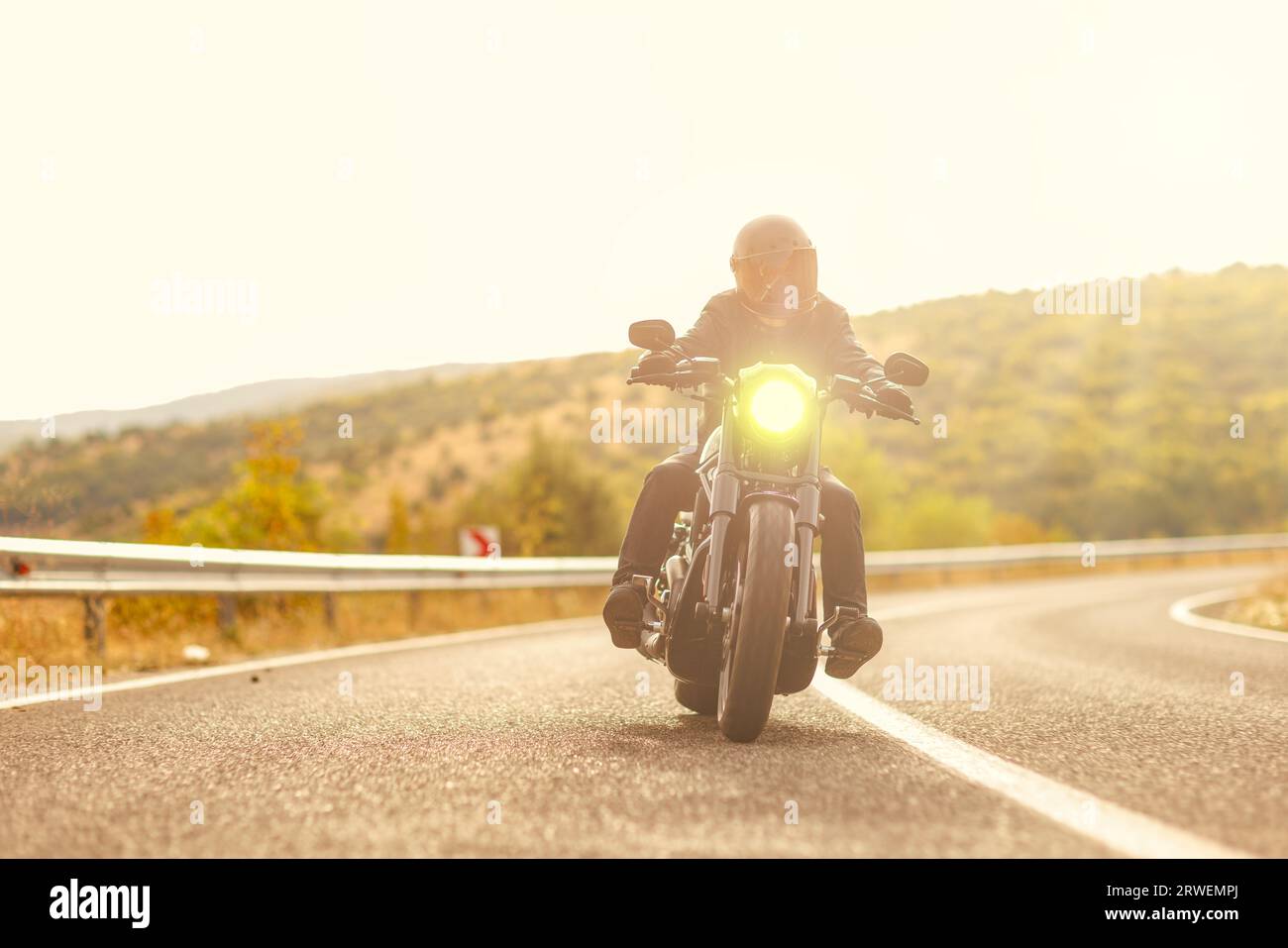 Rider on a chopper motorcycle road hi-res stock photography and images ...