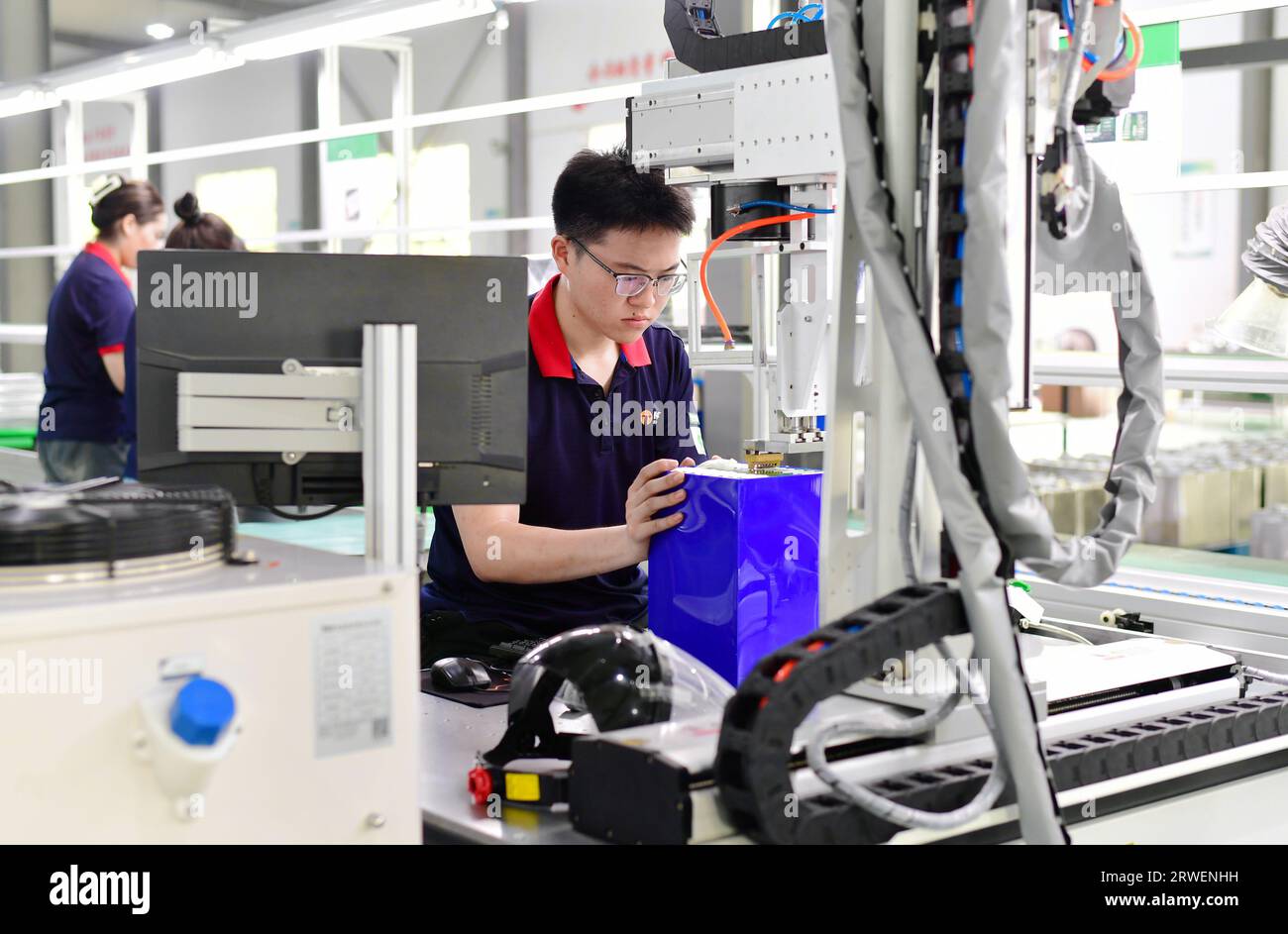 HAIAN, CHINA - SEPTEMBER 19, 2023 - Workers test the "shared battery ...