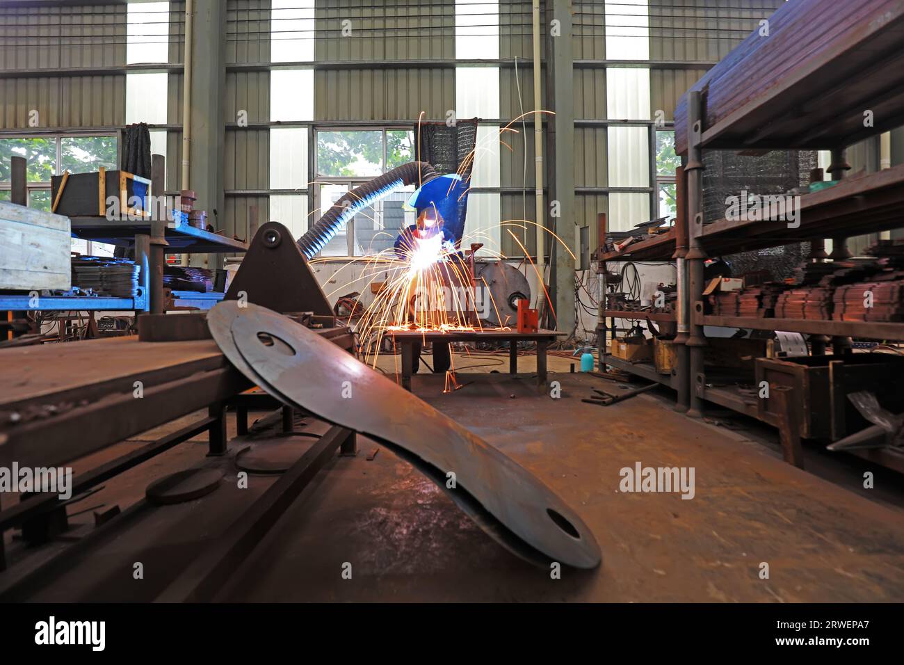 Labor intensive production hi-res stock photography and images - Alamy