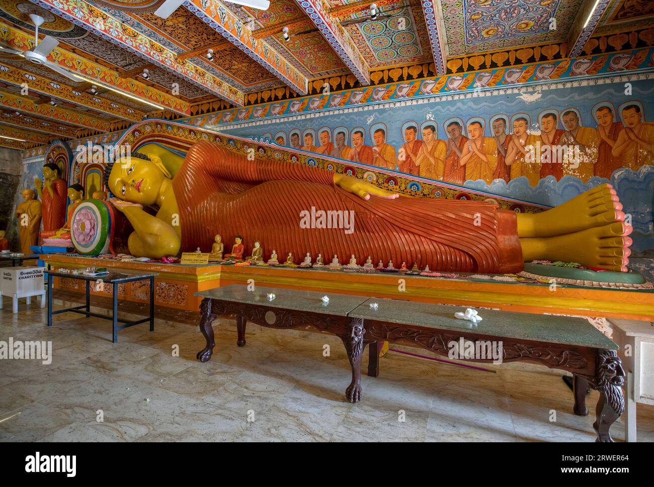 The laying Buddha statue within Isurumuni Raja Maha Viharaya at ...