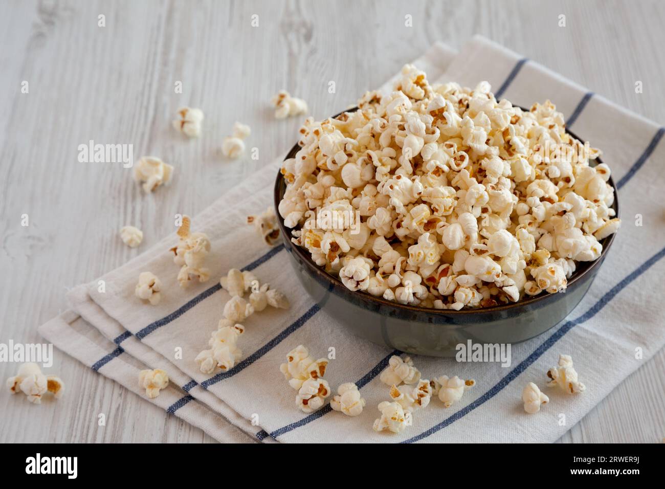 Homemade Buttered Popcorn with Salt in a Bowl, side view Stock Photo ...