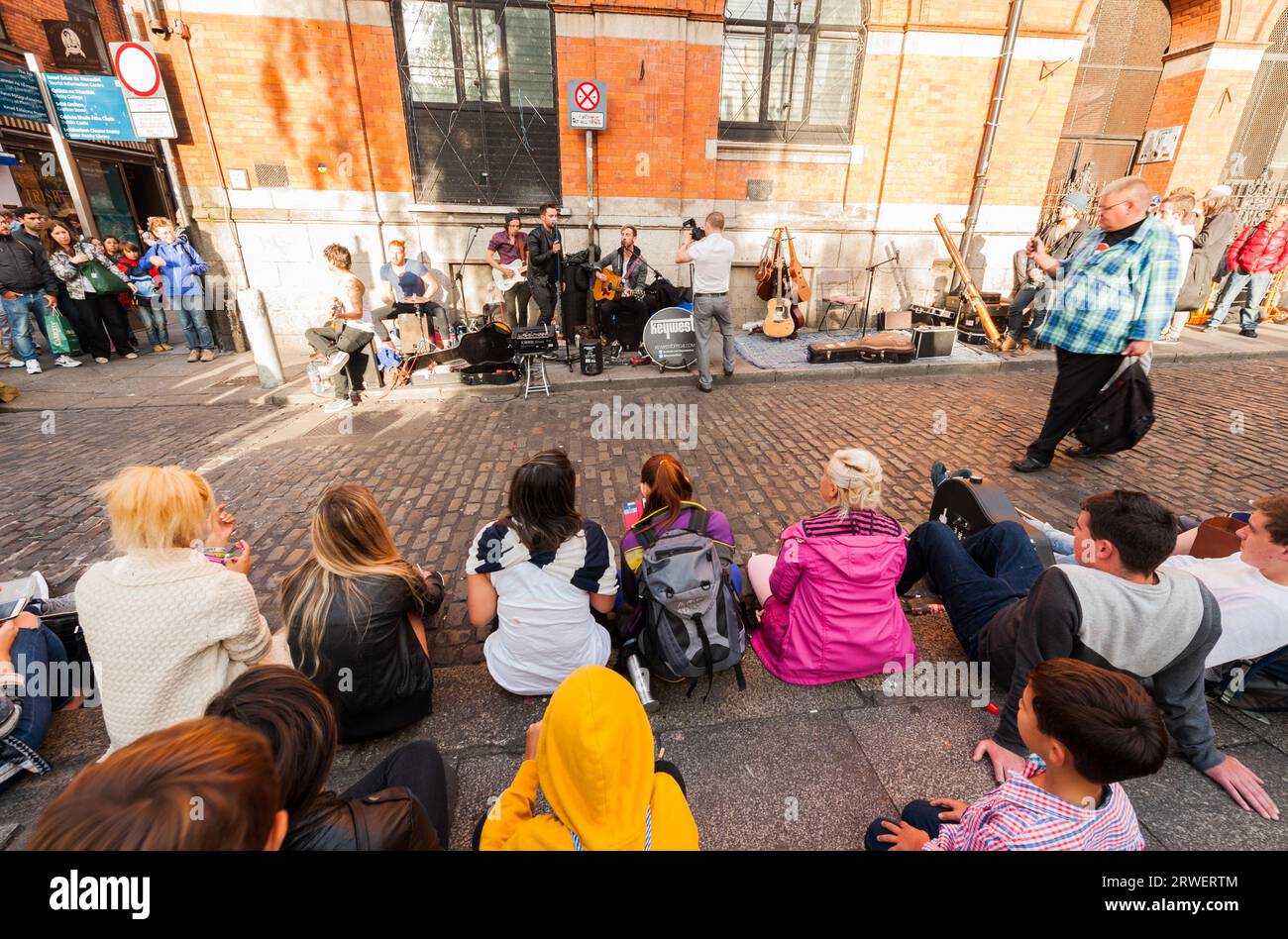 Dublin, Ireland - 08 16, 2015 Mass of people attending and filming ...
