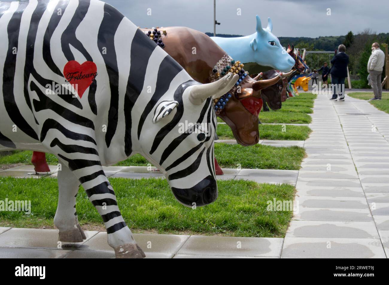 GRUYERE, SWITZERLAND - AUGUST 6, 2023: painted cows at Motel de la ...