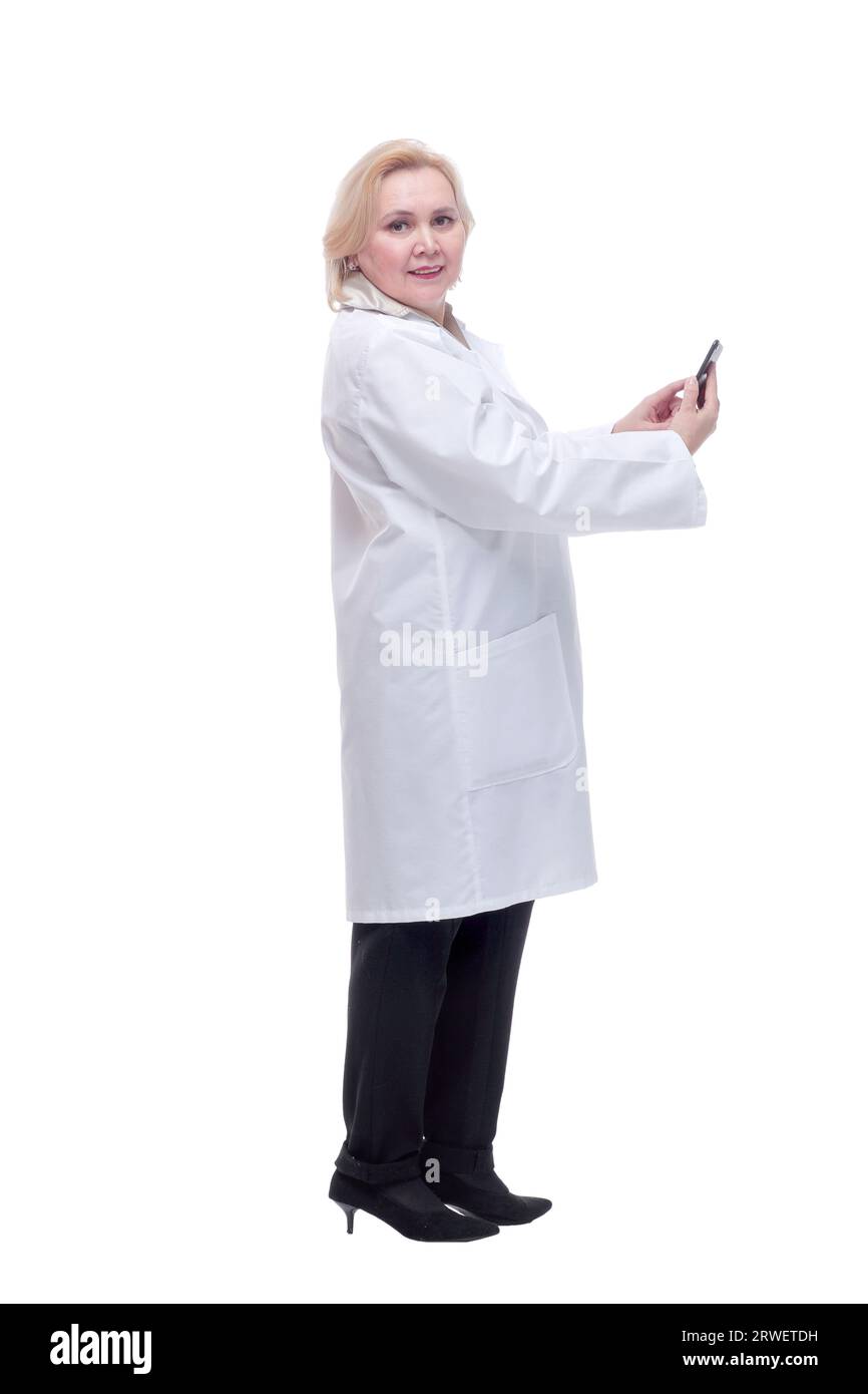 Concentrated beautiful female doctor reading text message Stock Photo ...