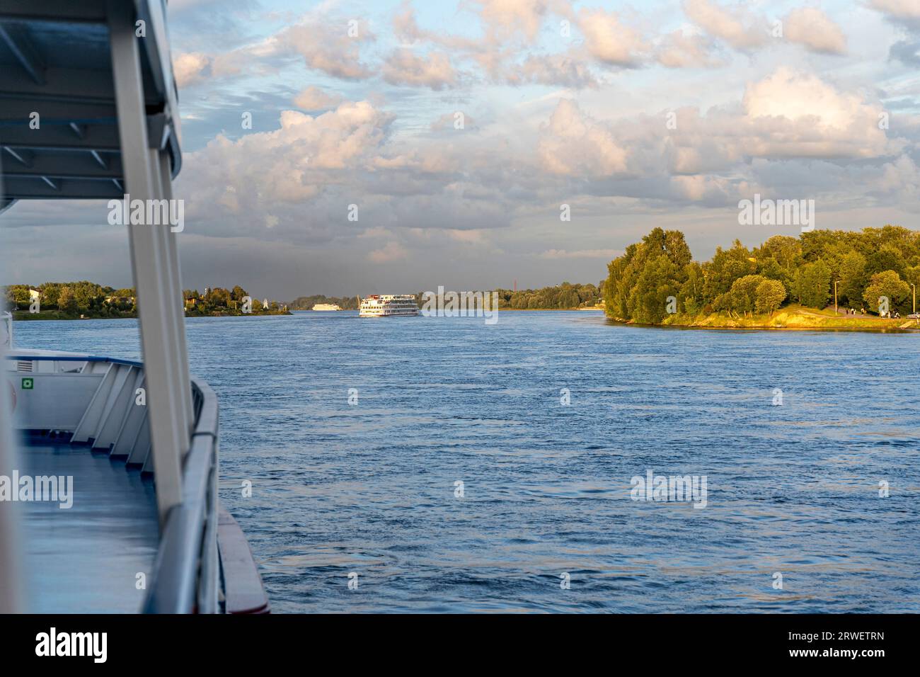 view from the deck of a sailing ship on the river and the ships going ...