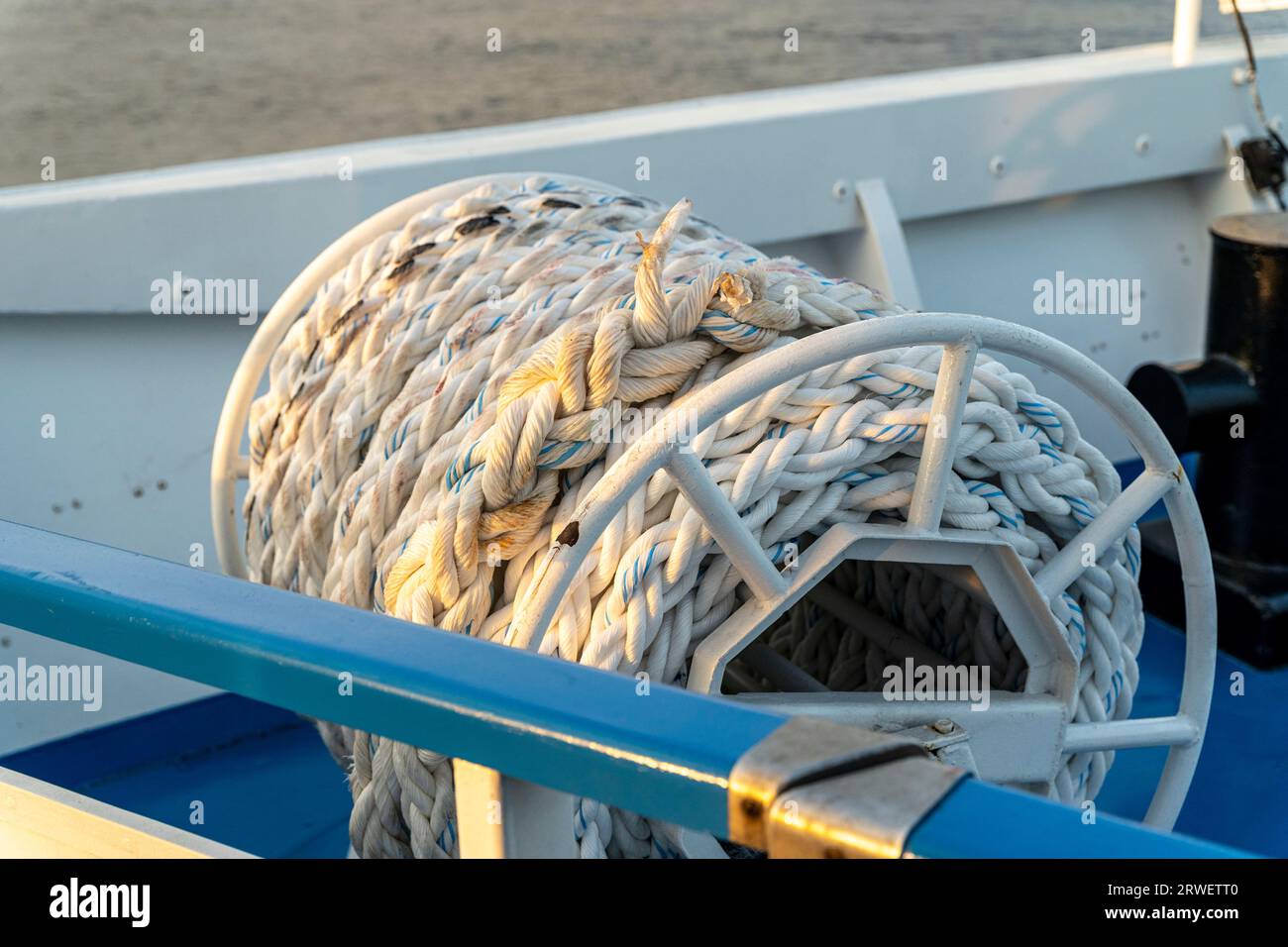 a reel with a strong ship rope on the deck of the ship. modern ...