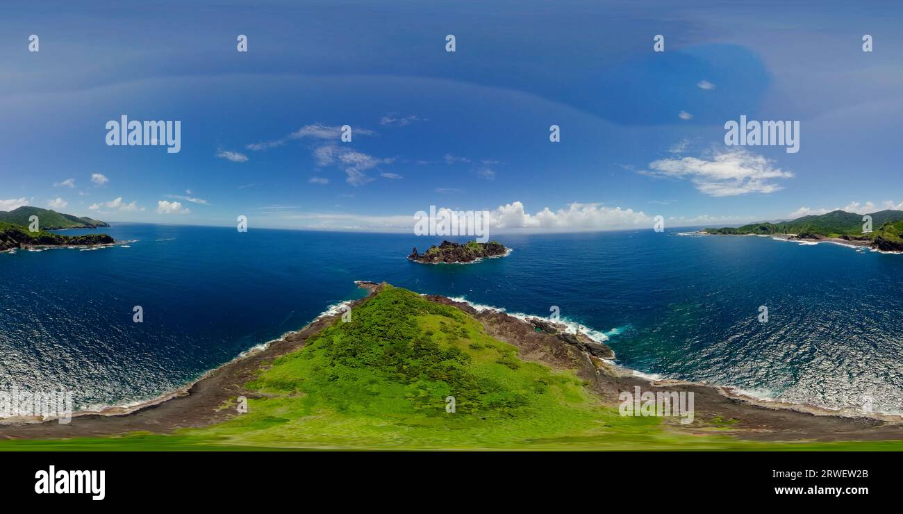 Spanish lighthouse on tropical island and blue ocean. Palaui island ...