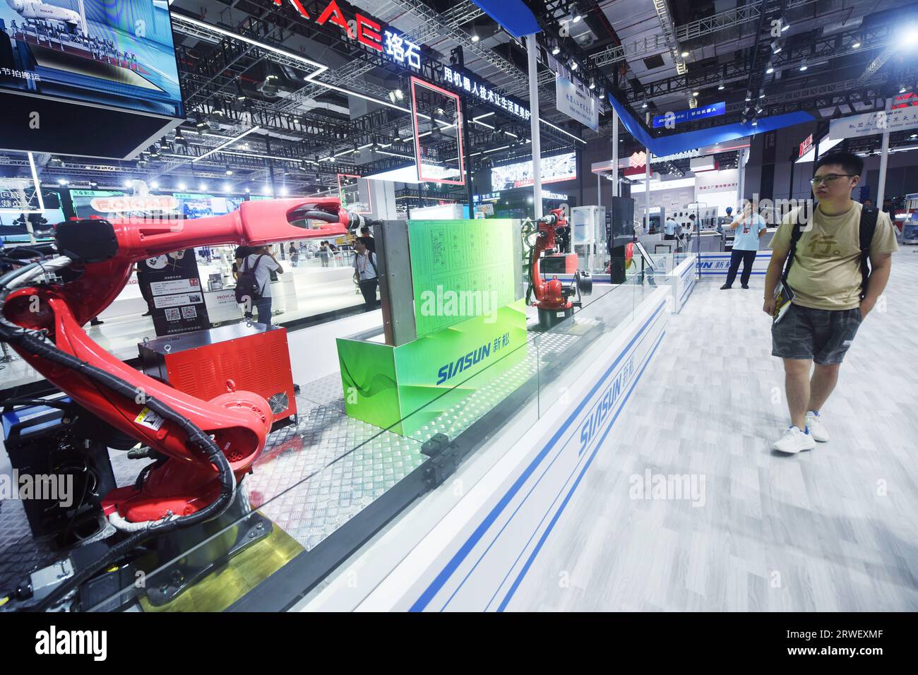 SHANGHAI, CHINA - SEPTEMBER 19, 2023 - Visitors watch Siasun's ...