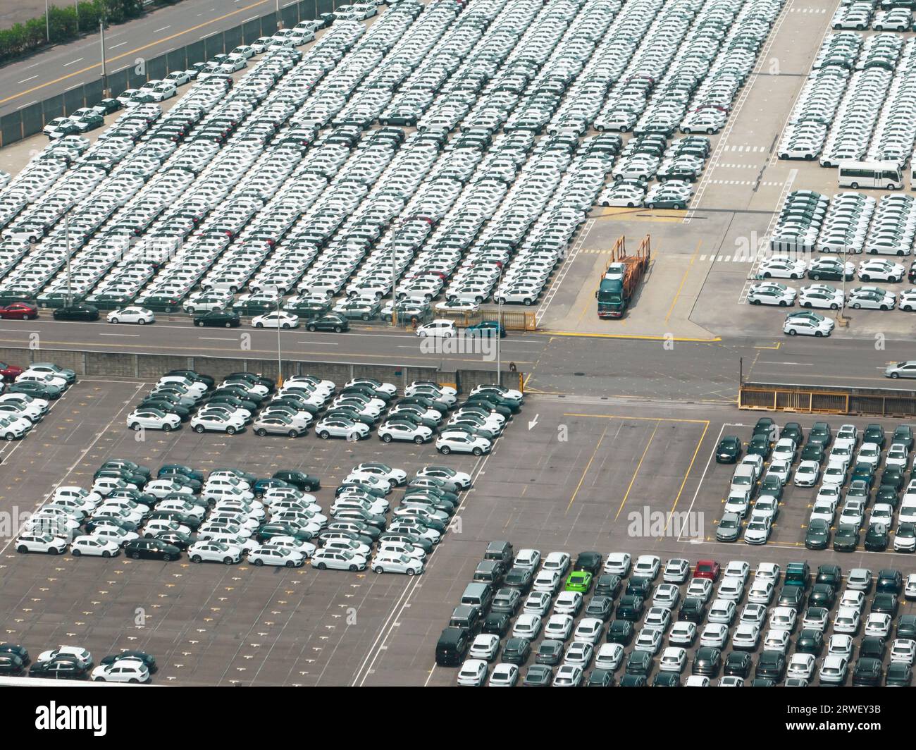Aerial view of New car lined up in the port for import export around ...