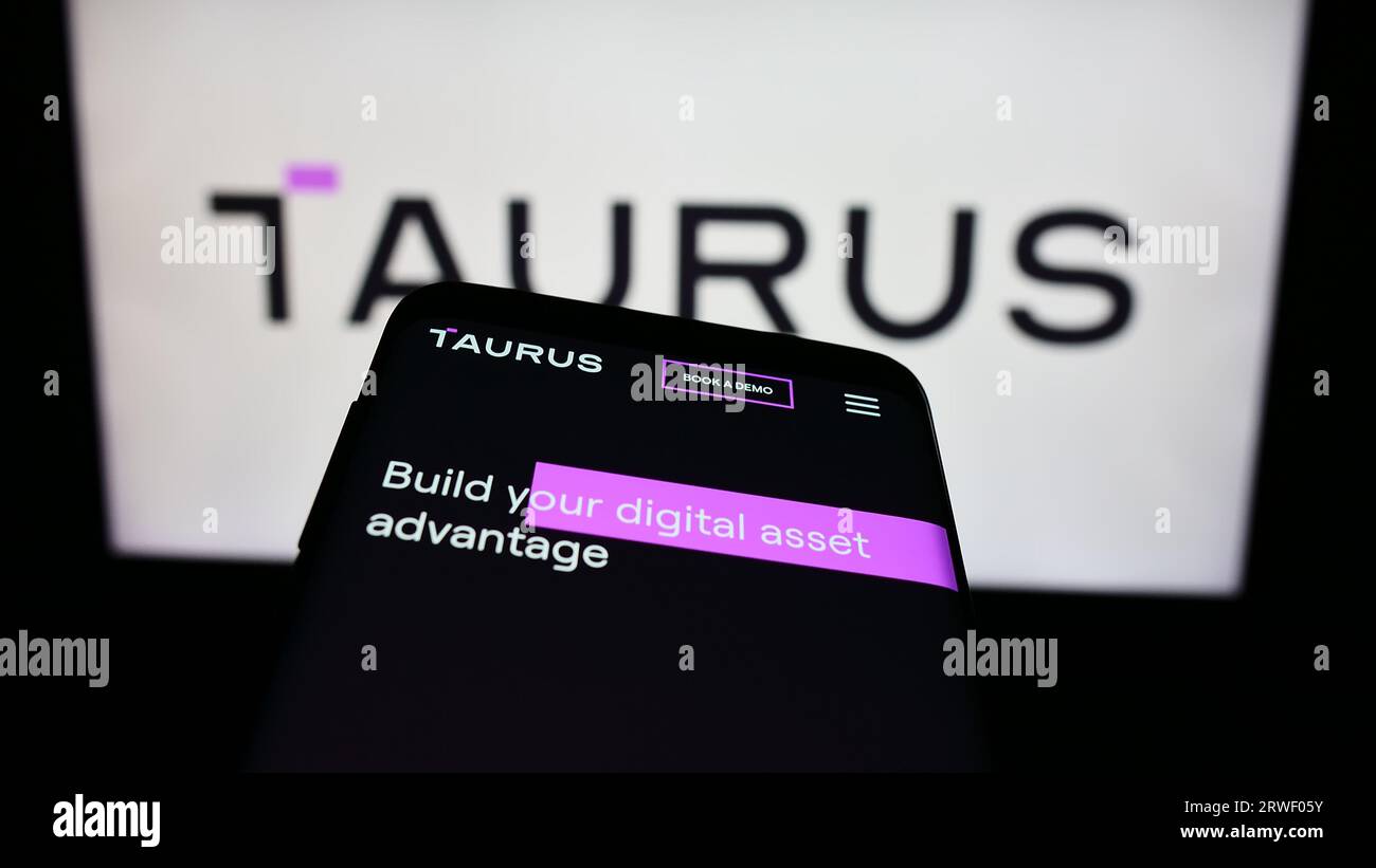 Mobile phone with website of Swiss digital assets company Taurus SA on ...