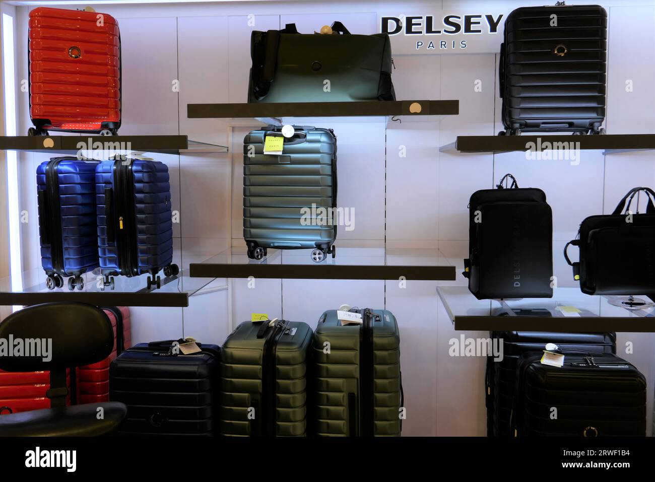 DELSEY SUITCASES ON DISPLAY INSIDE THE FASHION STORE Stock Photo - Alamy