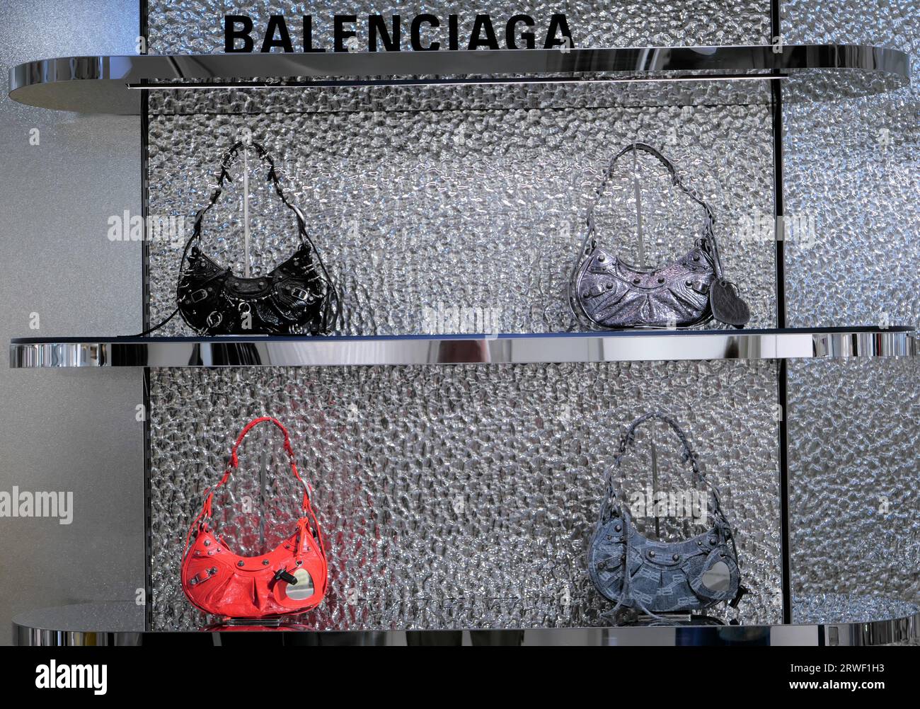 BALENCIAGA WOMAN'S BAGS ON DISPLAY INSIDE THE FASHION STORE Stock Photo ...