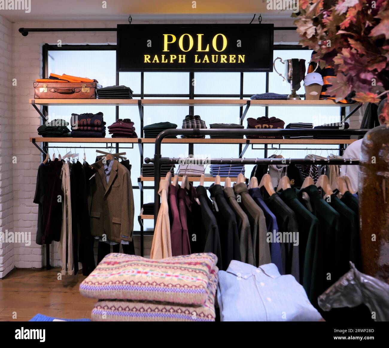 POLO RALPF LAUREN CLOTHING ON DISPLAY INSIDE THE FASHION STORE Stock ...