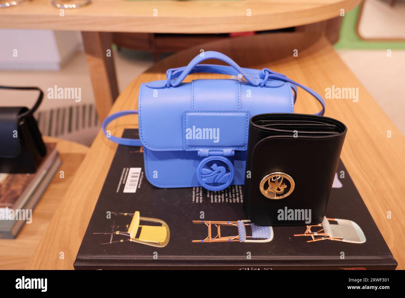LONGCHAMP WOMEN' BAGS ON DISPLAY INSIDE THE FASHION STORE Stock Photo ...