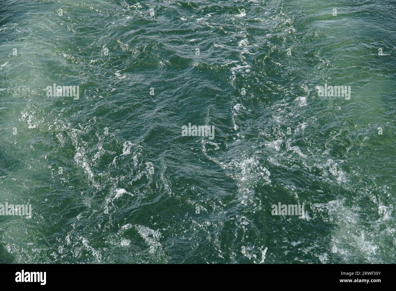 Rough water surface with waves Stock Photo - Alamy