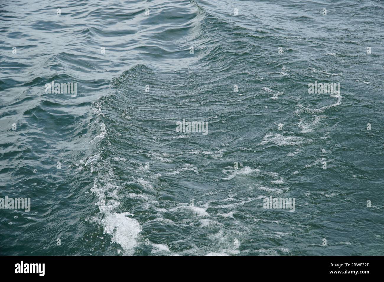 Rough water surface with waves Stock Photo - Alamy