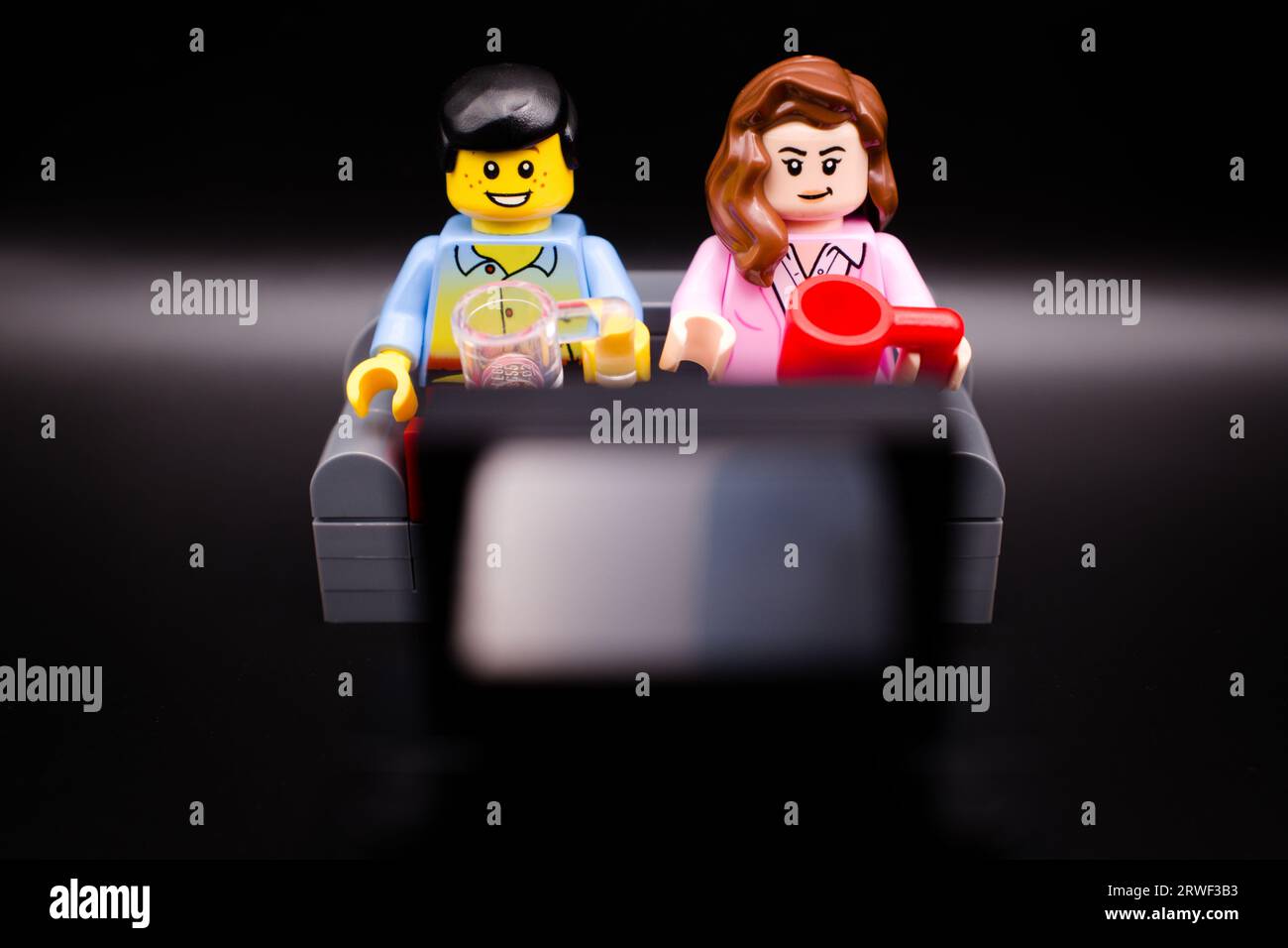 Black family watching tv hi-res stock photography and images - Alamy