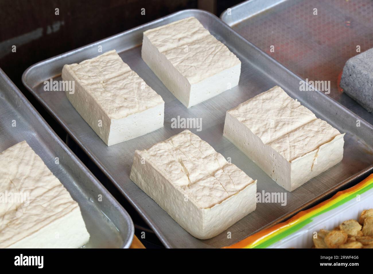 Korean food at Nambu Market in Jeonju, South Korea. Fresh tofu blocks ...
