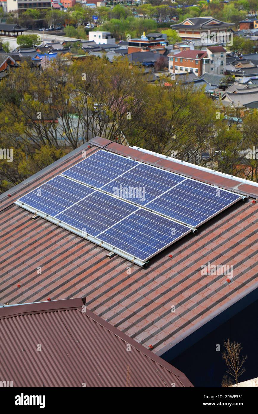 Solar panels on generic house roof. Photovoltaic energy generation in ...