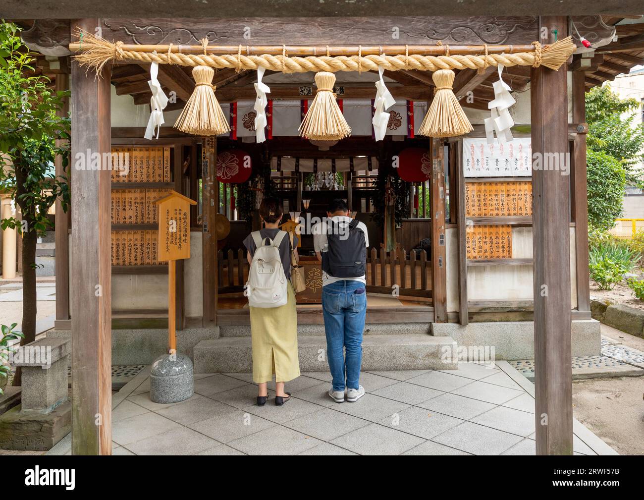 Japanese people praying at Kushida-jinja shinto shrine, Kyushu region ...