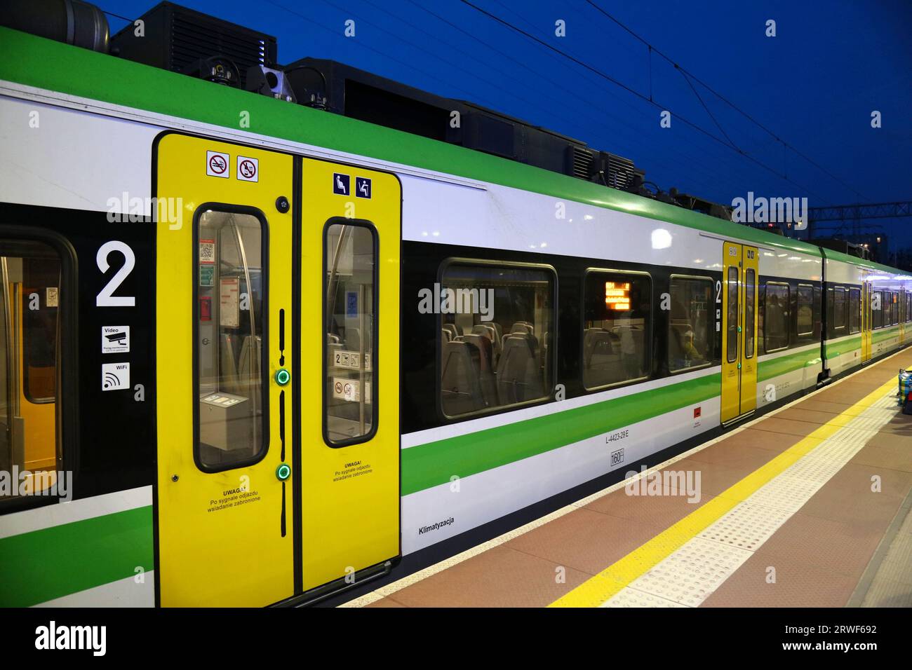WARSAW, POLAND - APRIL 12, 2023: Koleje Mazowieckie passenger train at ...