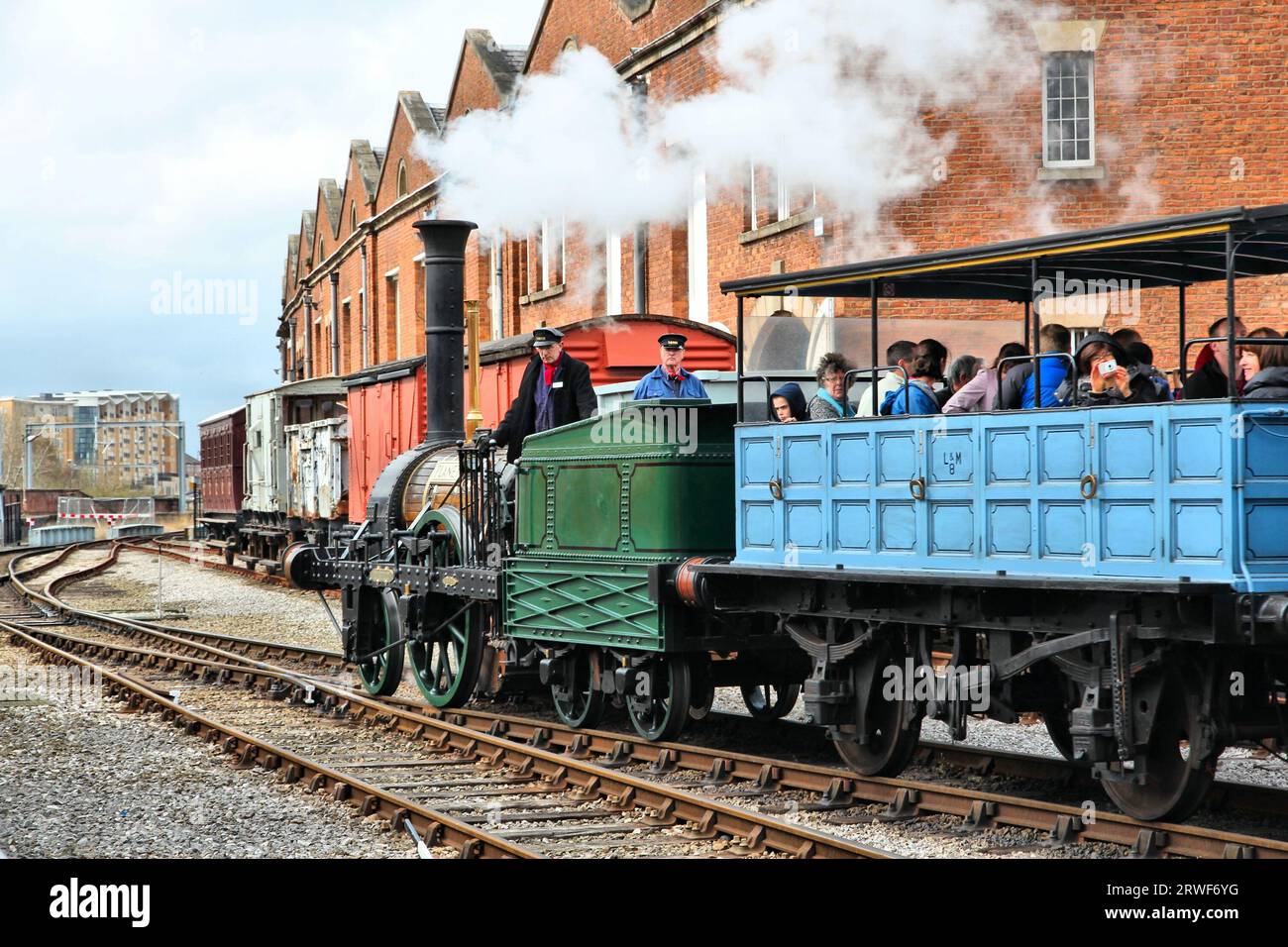 MANCHESTER, UK - APRIL 21, 2013: People ride Planet steam train replica ...