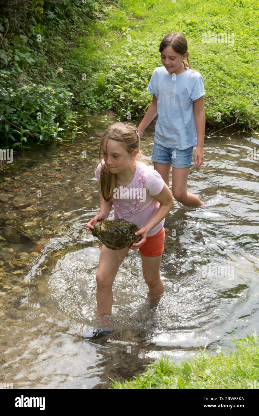 Two girls playing in play hi-res stock photography and images - Alamy