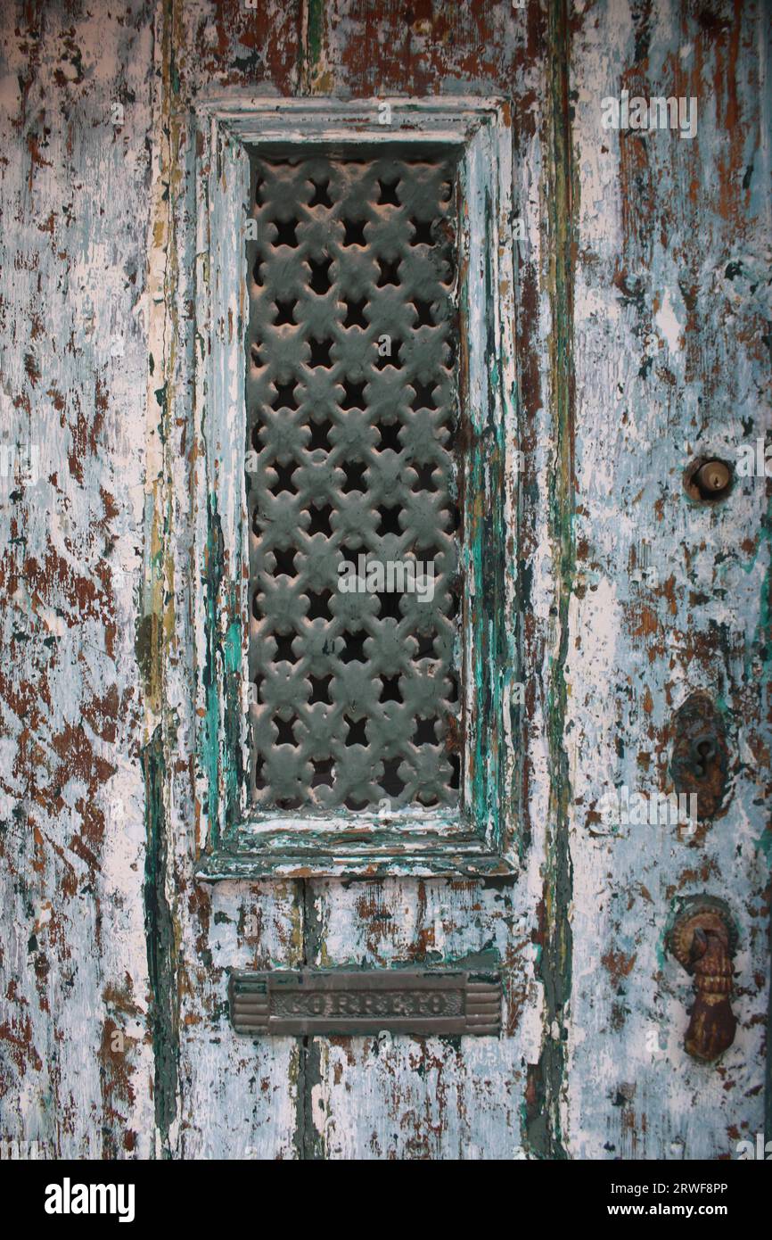 A Vintage looking Front Door with Distressed Paintwork Stock Photo - Alamy