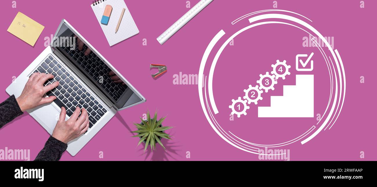 Top view of hands using laptop with symbol of action plan concept Stock ...