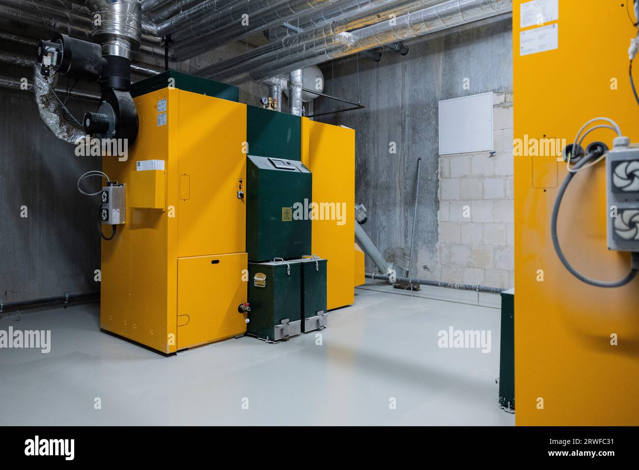 Wuppertal, Germany. 19th Sep, 2023. A pellet heating system can be seen ...