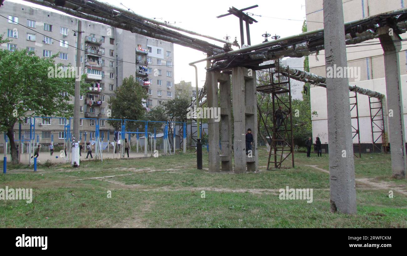 Soviet architecture with laundry drying between high-rise buildings ...