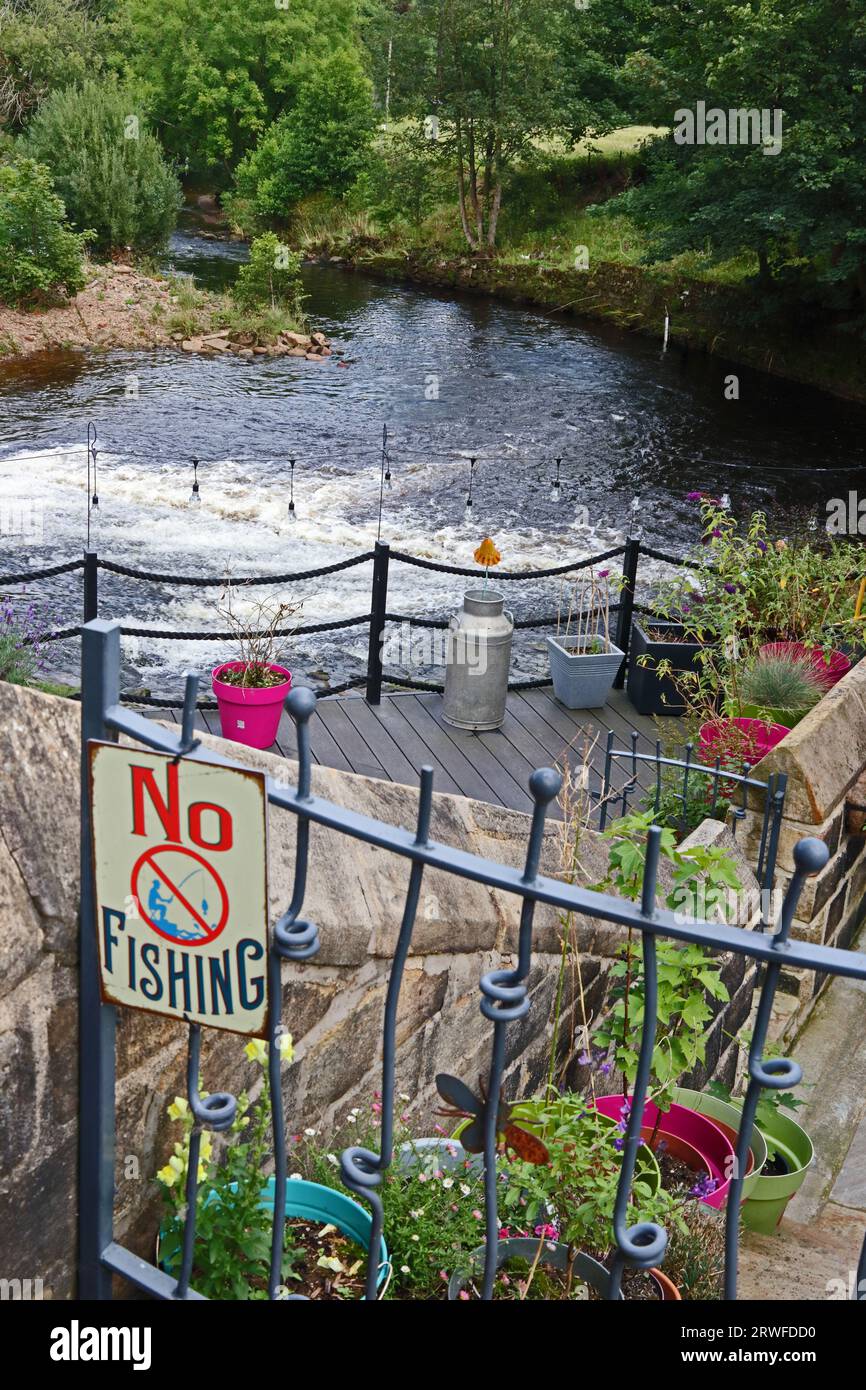 No Fishing sign by balcony over river Stock Photo - Alamy
