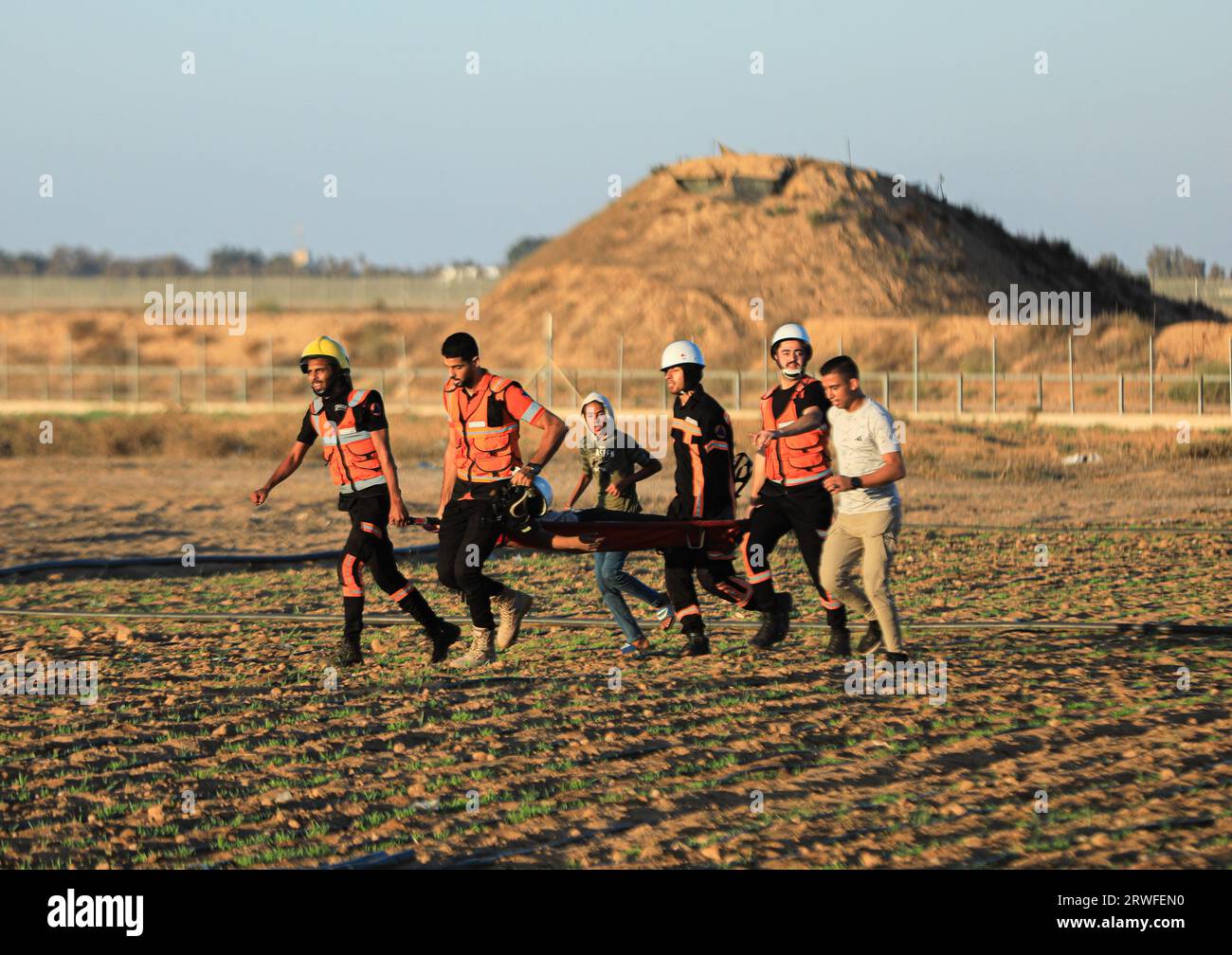 Gaza, Palestine. 17th Sep, 2023. Palestinian paramedics carry an ...