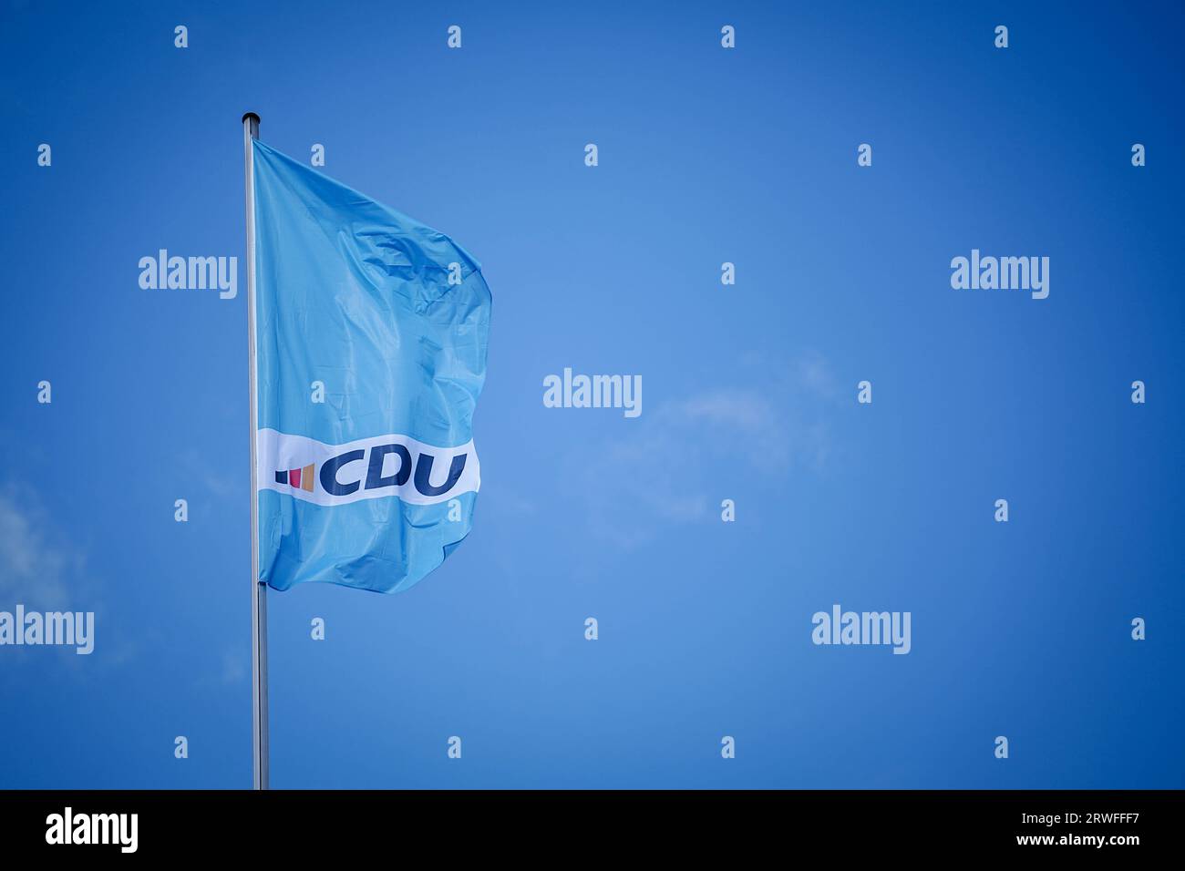 19 September 2023, Berlin: A flag with the new CDU logo flies in the ...