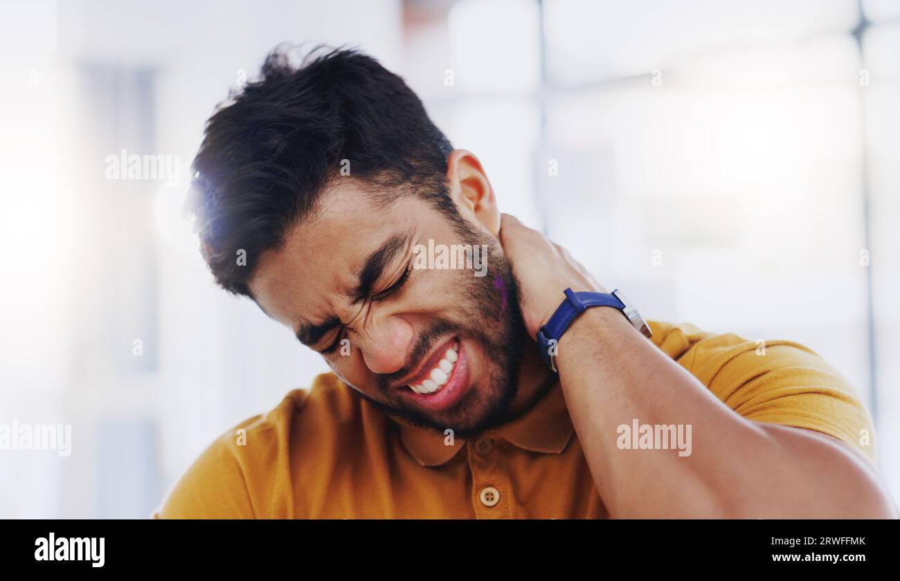 Laptop, neck pain and business man with injury in office workplace ...