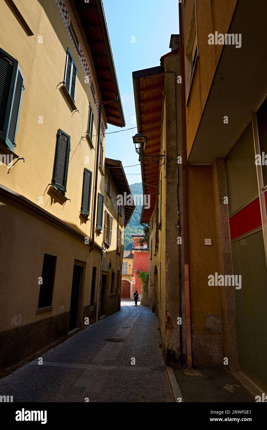Italy, Lombardia, Canzo, narrow alley at historic old town. Street ...