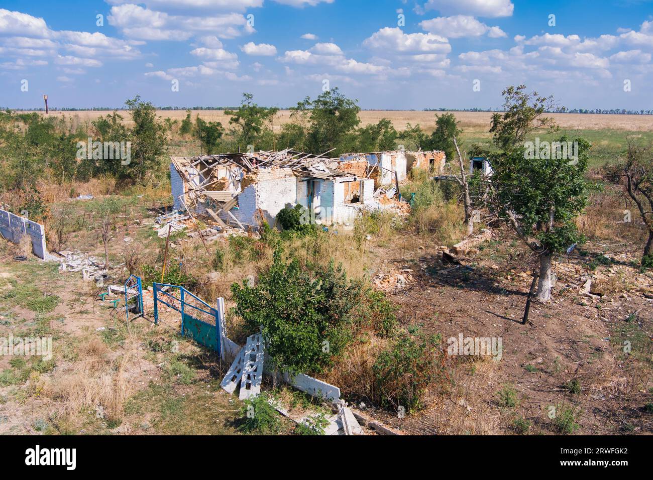 Aerial view of a destroyed village in the countryside after a battle ...