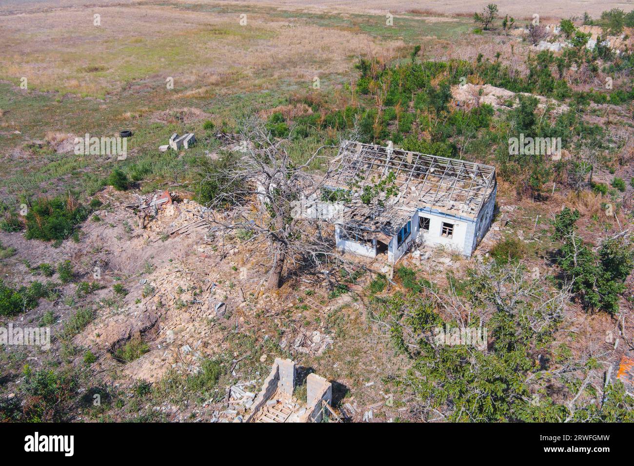 Aerial view of a destroyed village in the countryside after a battle ...