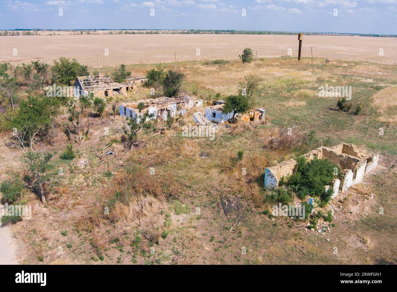 Aerial view of a destroyed village in the countryside after a battle ...