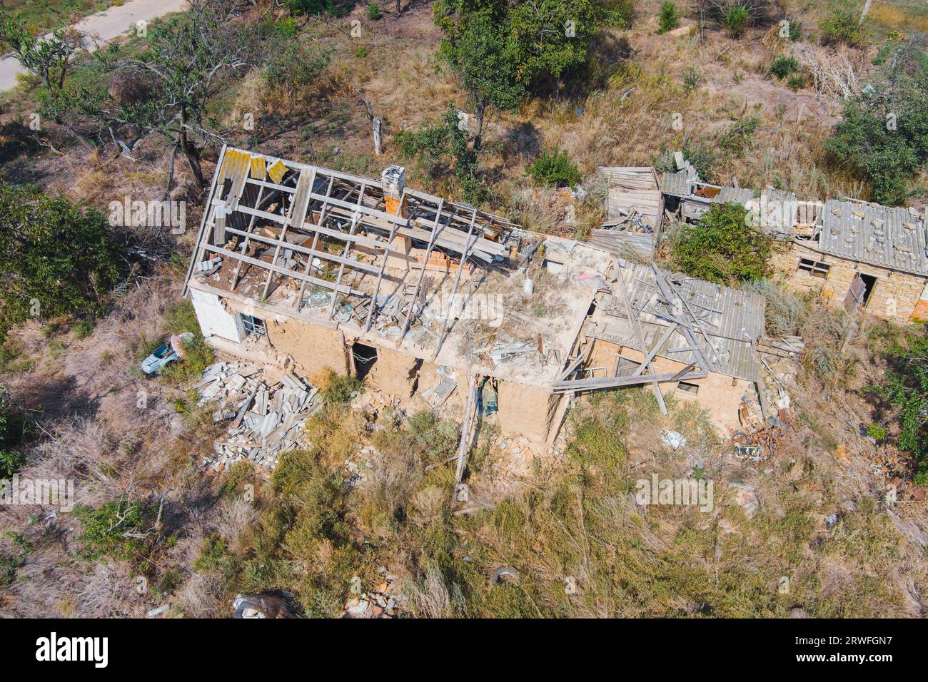 Aerial view of a destroyed village in the countryside after a battle ...