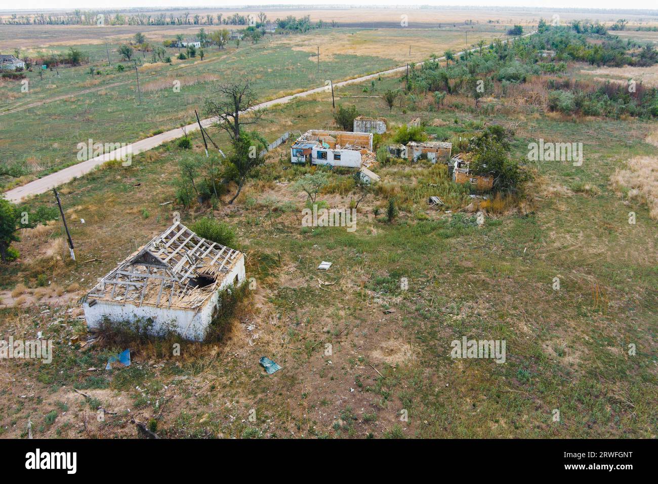 Aerial view of a destroyed village in the countryside after a battle ...