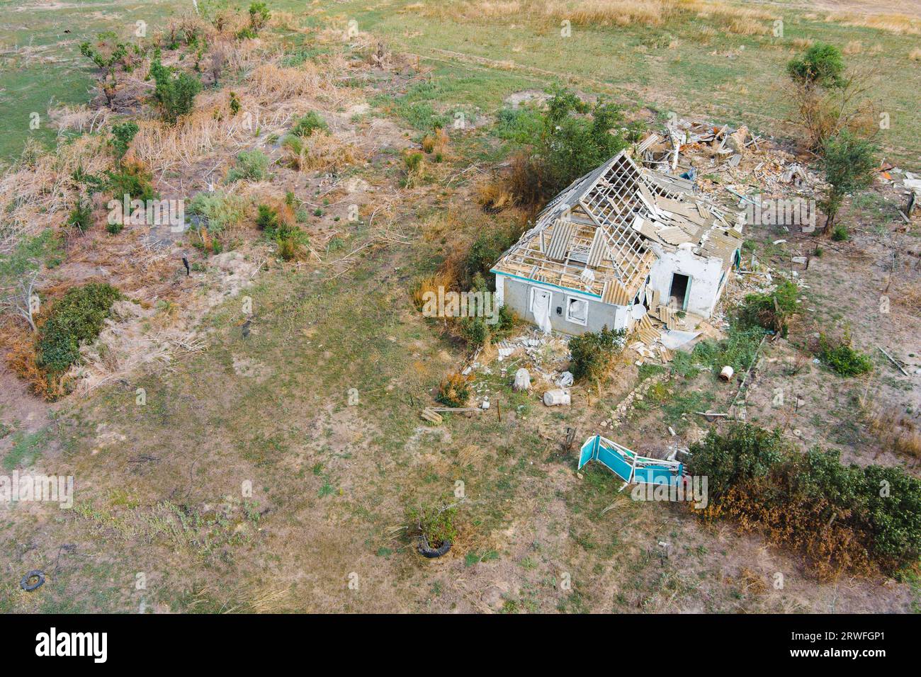 Aerial view of a destroyed village in the countryside after a battle ...