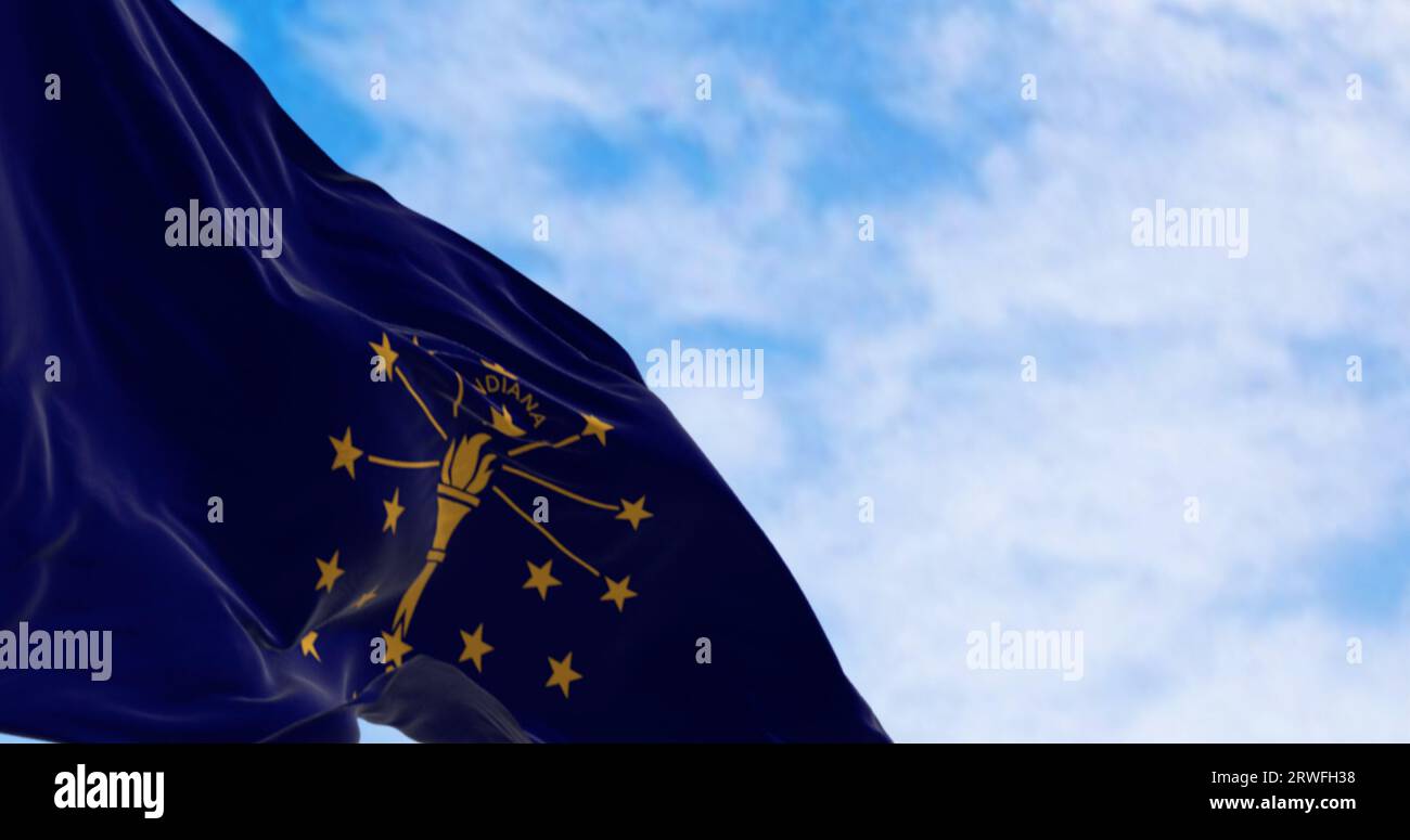 Close-up of indiana state flag waving in the wind on a clear day ...