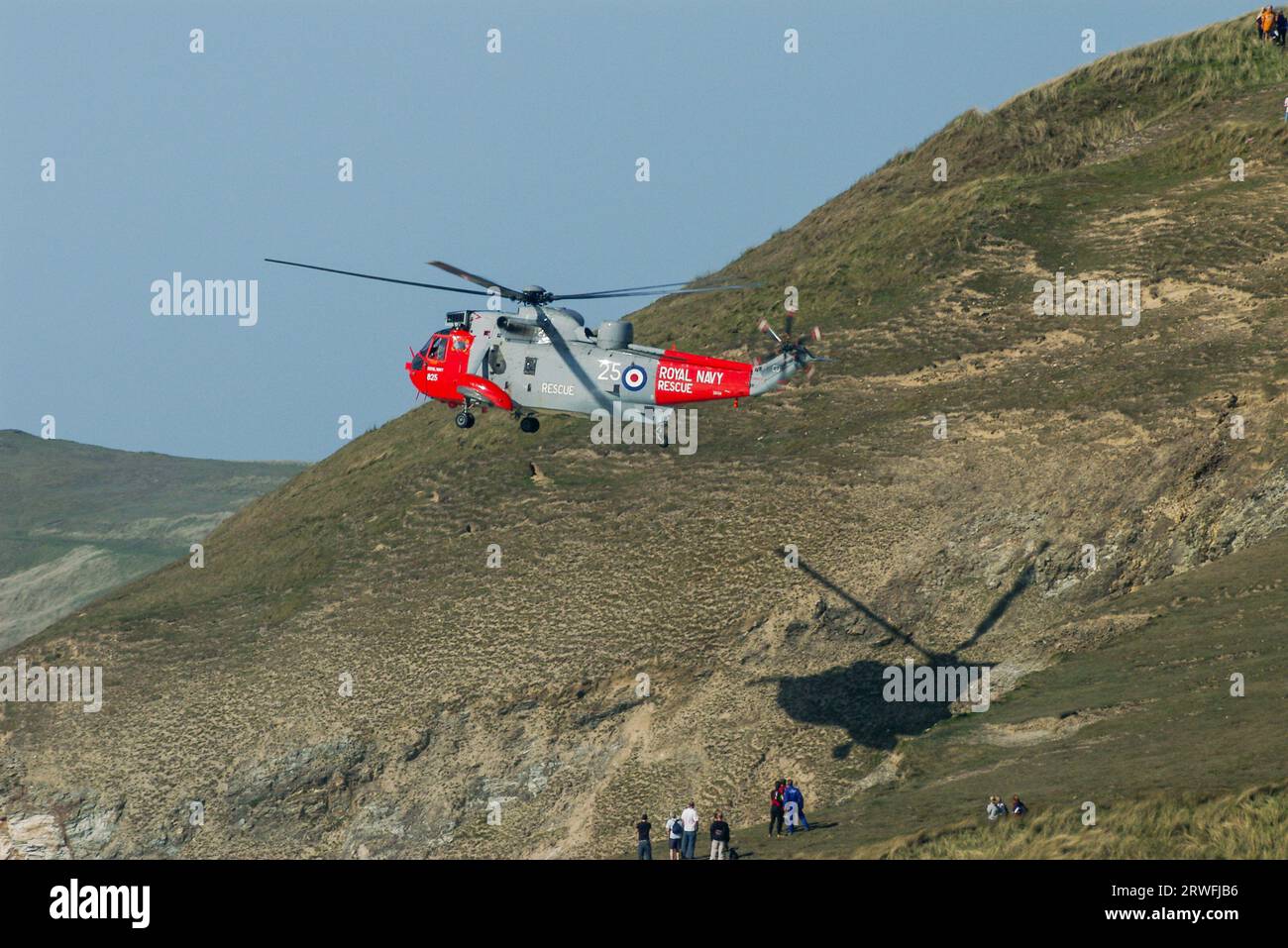Rescue of two men cut off by incoming tide near Perranporth & forced to ...