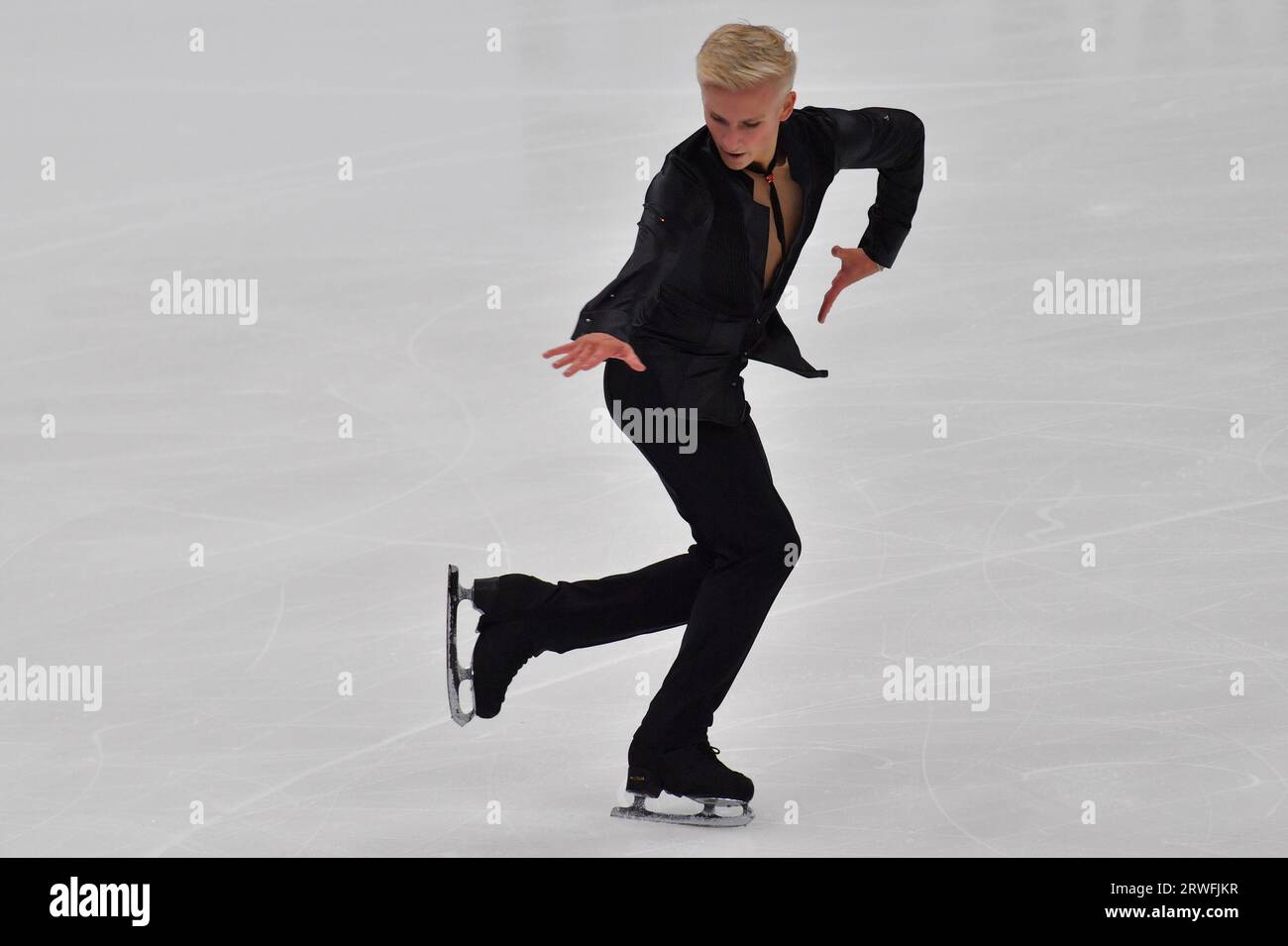 Moscow. Figure skater Matvey Vetlugin performs a free program in men's ...