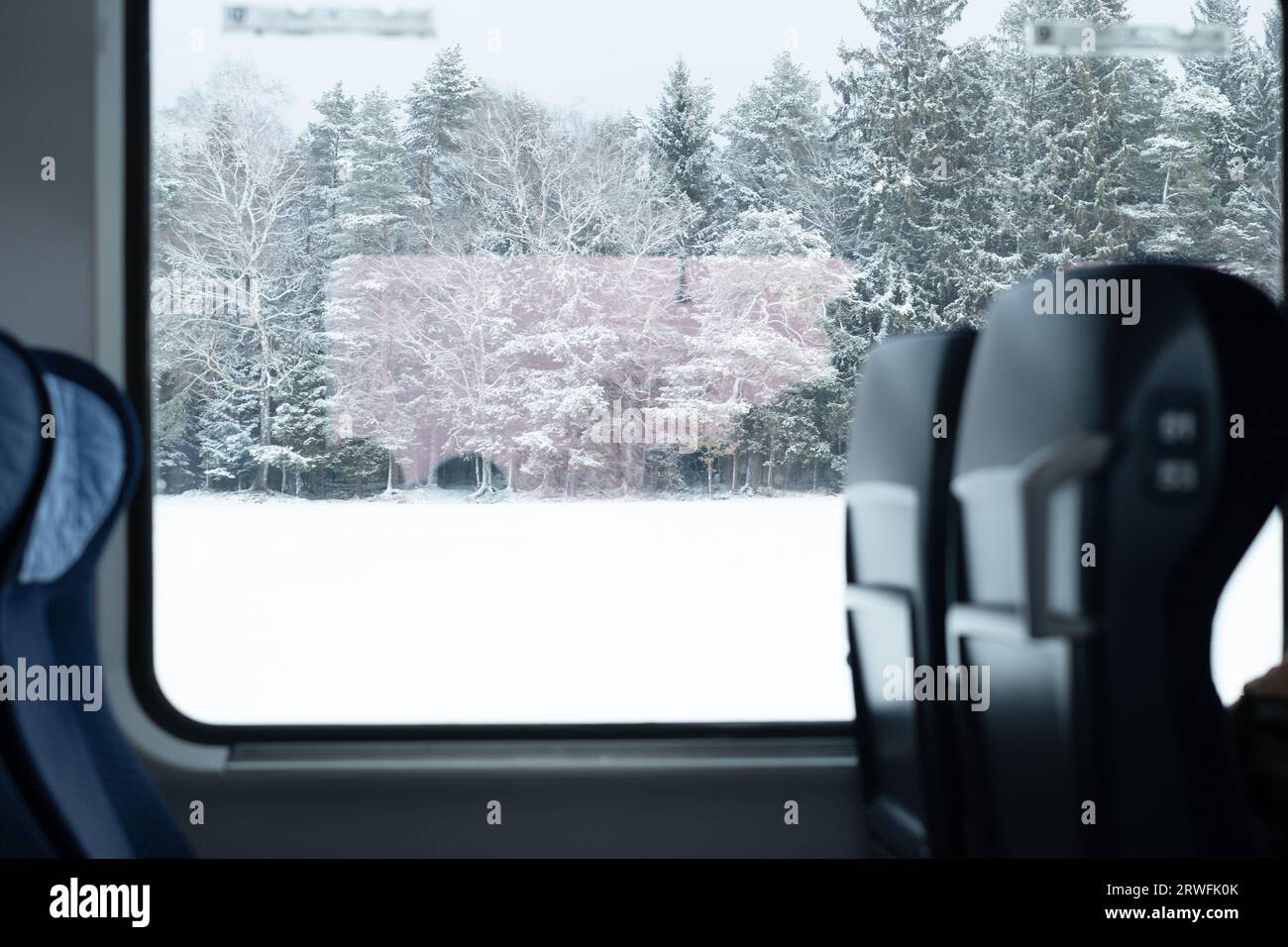 View from the train from Salzburg to Munich, showing snowy scenes ...